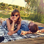 Whiling away the summer together | Buy Stock Photo on PeopleImages ...