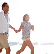 Being on the beach is invigorating | Buy Stock Photo on PeopleImages ...