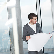 Looking over all his plans | Buy Stock Photo on PeopleImages, Picture ...