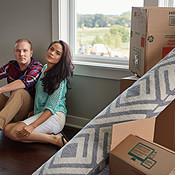 Unpacking a whole new life together | Buy Stock Photo on PeopleImages ...