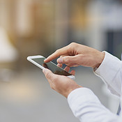 Sending out an update | Buy Stock Photo on PeopleImages, Picture And ...