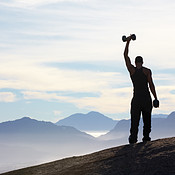 Conquering his world | Buy Stock Photo on PeopleImages, Picture And ...