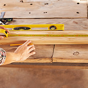 Double checking his measurements | Buy Stock Photo on PeopleImages ...