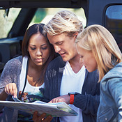 Mulling over a map | Buy Stock Photo on PeopleImages, Picture And ...
