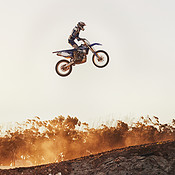 Leaving the track in his mirrors | Buy Stock Photo on PeopleImages ...