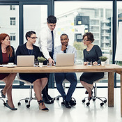 Sitting down with their problem-solving tools | Buy Stock Photo on ...