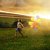 Frolicking through the fields | Buy Stock Photo on PeopleImages ...