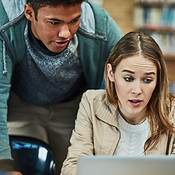 Helping each other with their assignments | Buy Stock Photo on ...