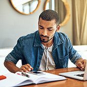 Crunching the numbers | Buy Stock Photo on PeopleImages, Picture And ...