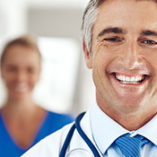 Greeting his patients with a smile | Buy Stock Photo on PeopleImages ...