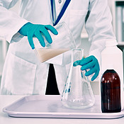 Setting up her experiment... | Buy Stock Photo on PeopleImages, Picture ...