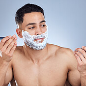 Which one will give the better shave | Buy Stock Photo on PeopleImages ...