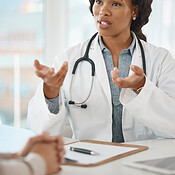 Doctor consulting, explaining diagnosis and medical checkup with ...