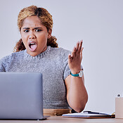 Stress, angry and frustrated corporate woman working on laptop, annoyed ...