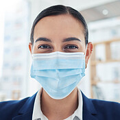 Safety, compliance and face mask covid regulations at work with a young ...