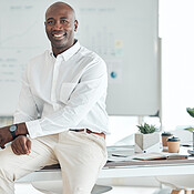 Black business man, leader and office in happy, proud and confident ...