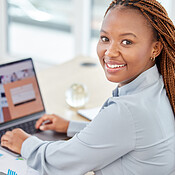 Black woman manager on laptop planning and working with company ...
