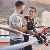Boxing ring, strong men at outdoor gym talking fight strategy for ...