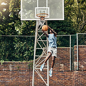 Basketball, jump and sports man on basketball court working on game fitness, workout or slam ...