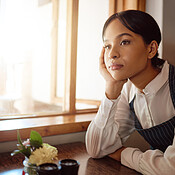 Restaurant, stress and waitress thinking of future goal while ...