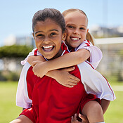 Portrait, friends and soccer player bonding at a field, having fun ...
