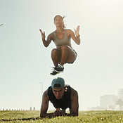 Energy, training and intense couple workout in a park with serious ...