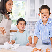 Cooking, help and mother with children in kitchen for learning ...