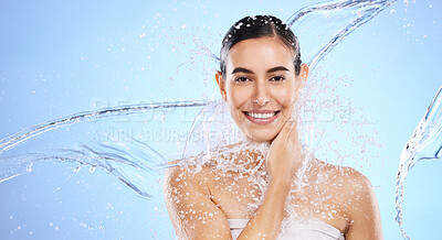 Water splash, girl or cleaning hands in studio on blue background for ...