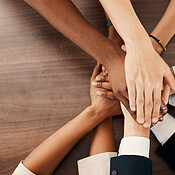 Stack, hands and business people at team building in office for ...