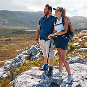 Health, hiking and couple on mountain range for workout, balance and ...