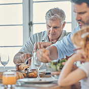 Eating, dining room and senior man with his family enjoying a meal ...