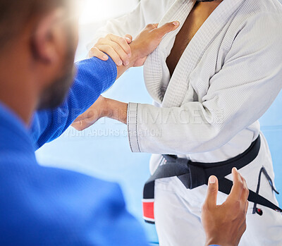 Portrait, karate and sensei with a sports man kneeling on the gym floor ...