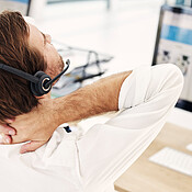 Neck pain, call center and man in office with stress, burnout and ...