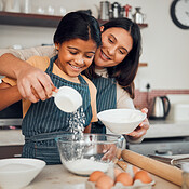 Family, baking and helping with food in home kitchen with mother and ...