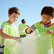 Recycling, plastic and asian children at beach cleaning for education ...