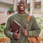 Campus, student and portrait of black man at college building, academy ...