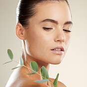 Skincare, woman and beauty with natural plant on skin for green ...