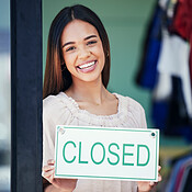 Business owner, holding and portrait of a woman with a sign for a ...