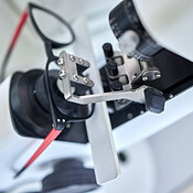 Optometry, vision and a lens meter in a clinic to measure or adjust the ...