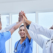Success, high five and teamwork with doctors in hospital cheering for ...