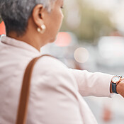 Watch, senior woman and check time for appointment, deadline and ...