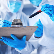 Teamwork, blood checklist or doctors hands in lab with notebook for ...