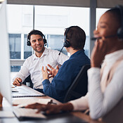 Call center, telemarketing and employees talking, customer service and ...