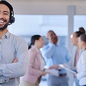 Call center, smile and portrait of customer service agent with headset ...