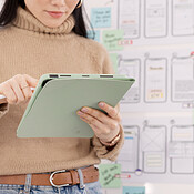 Woman, tablet and ui ux design with the developer being creative for ...