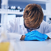 Stress, burnout or black woman scientist with headache for medical ...