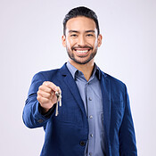 Realtor man, keys and studio portrait with smile, dream and excited ...