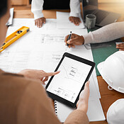 Tablet, floor plan and engineering people planning, project management ...