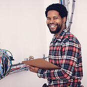 Cable inspection, portrait and a black man for maintenance, building ...