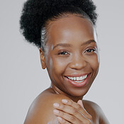 Black woman, face and cream in beauty portrait, cosmetic product and ...